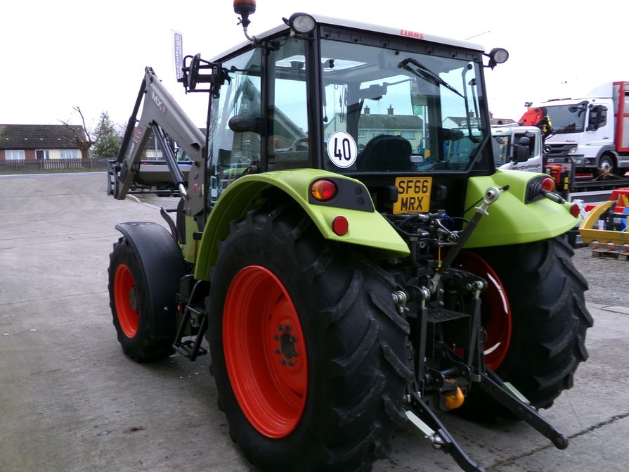2016 Claas 330 Axos with MX U308 Loader - McCullagh Machinery